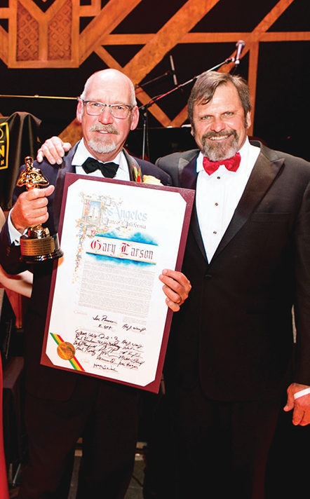Gary Larson being honored by Grand Vision Foundation in 2016, with Alan ...