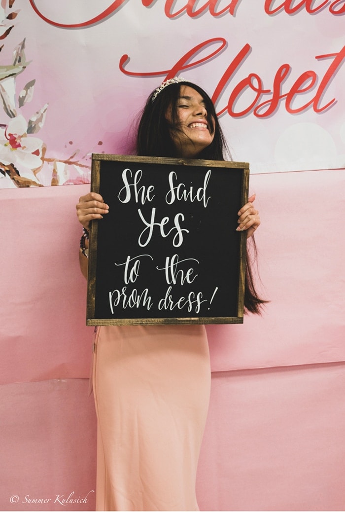 A student models a prom dress from Maria’s Closet. (photo: Summer Kulusich)