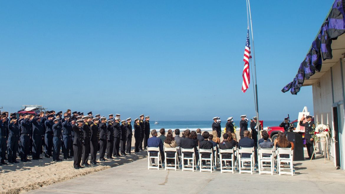 Flag ceremony and memorial service for ocean lifeguard Derek Traeger at ...