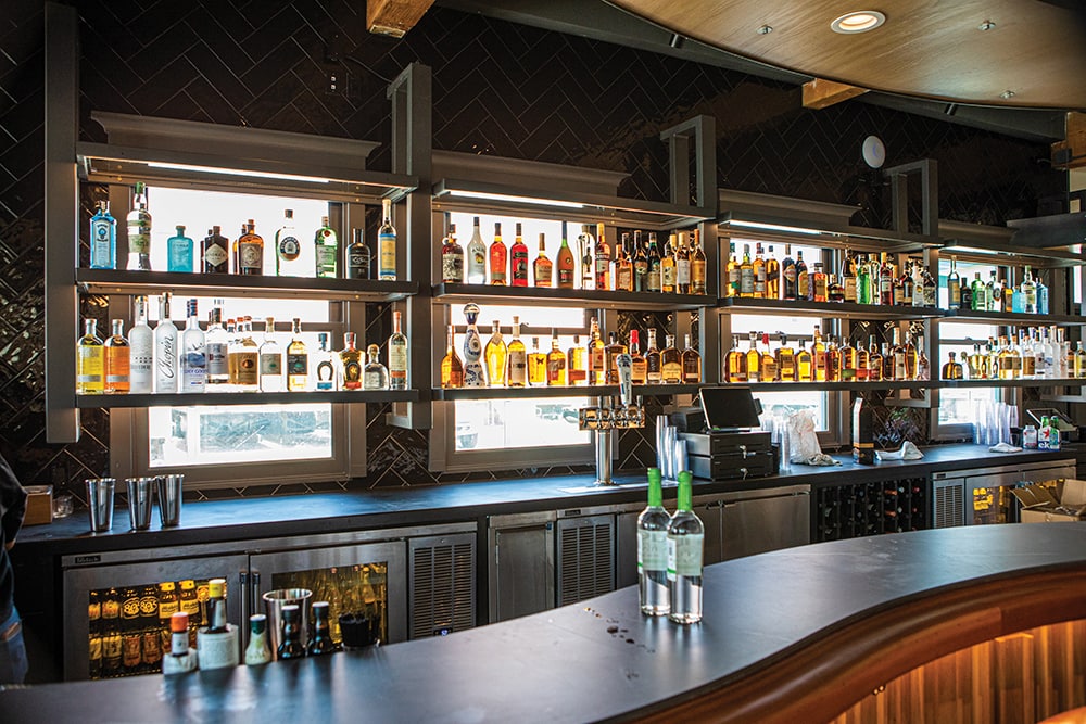 The serpentine bar refurbished from TC’s Cocktail Lounge. (photo: John ...